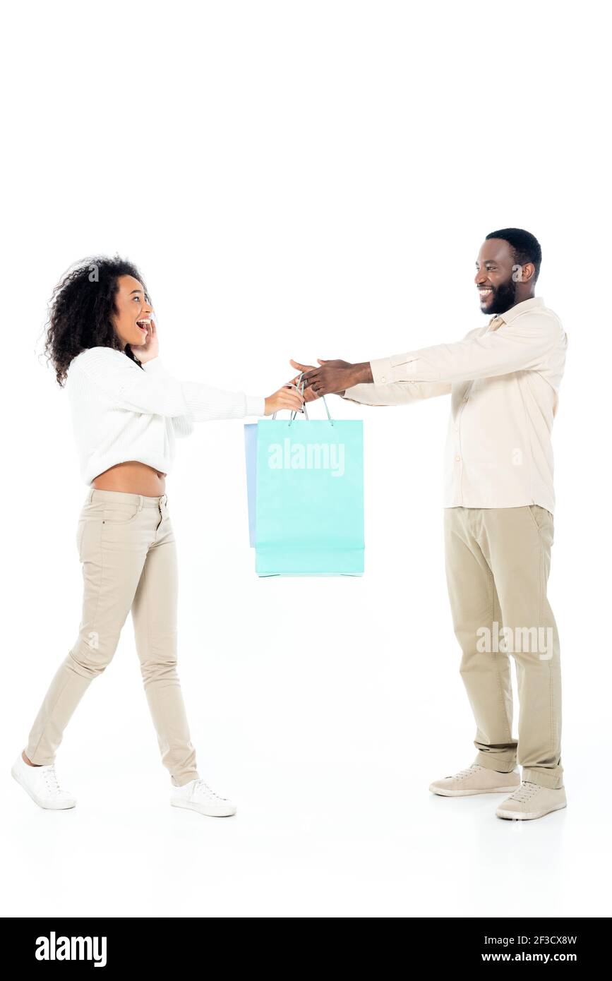 Amazed young african woman Cut Out Stock Images & Pictures - Alamy