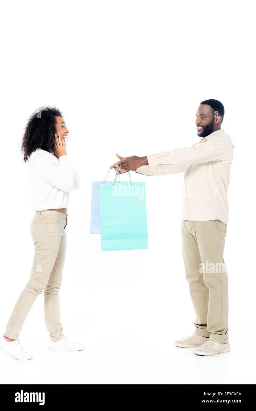 Amazed young african woman Cut Out Stock Images & Pictures - Alamy