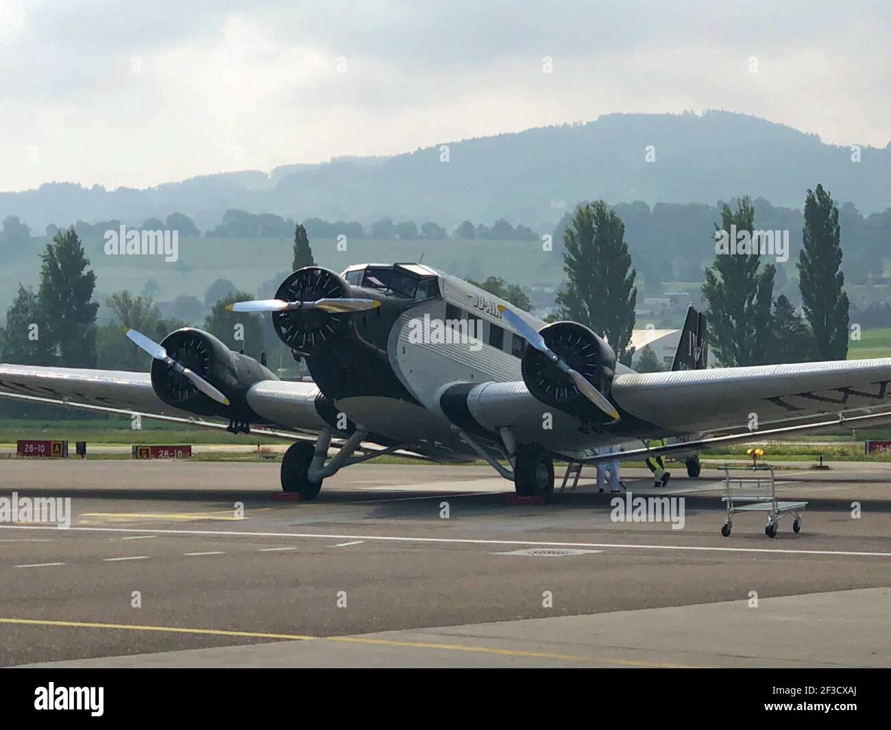 Historic old Junkers Ju-52 aircraft is parking at the airport Saint ...