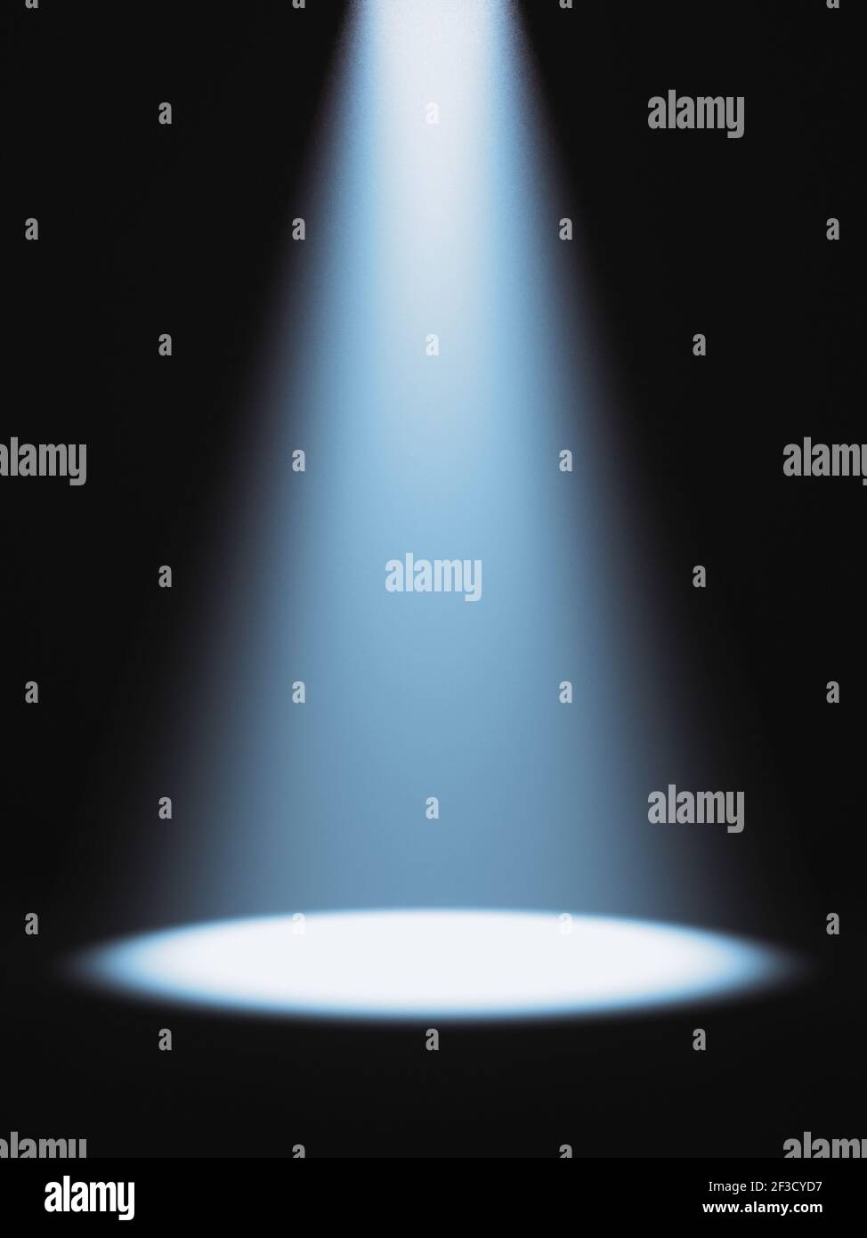 Defocused view on empty studio background lit from top by round ...