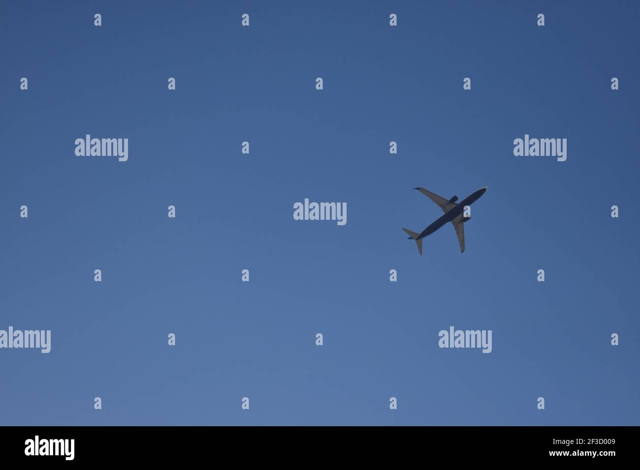 Plane caught with the camera in flight Stock Photo - Alamy