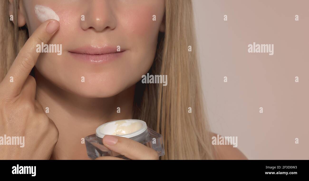 Lips applying cream hi-res stock photography and images - Alamy
