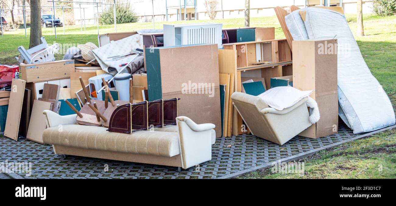 Panorama bulky waste on the roadside in the city Stock Photo - Alamy