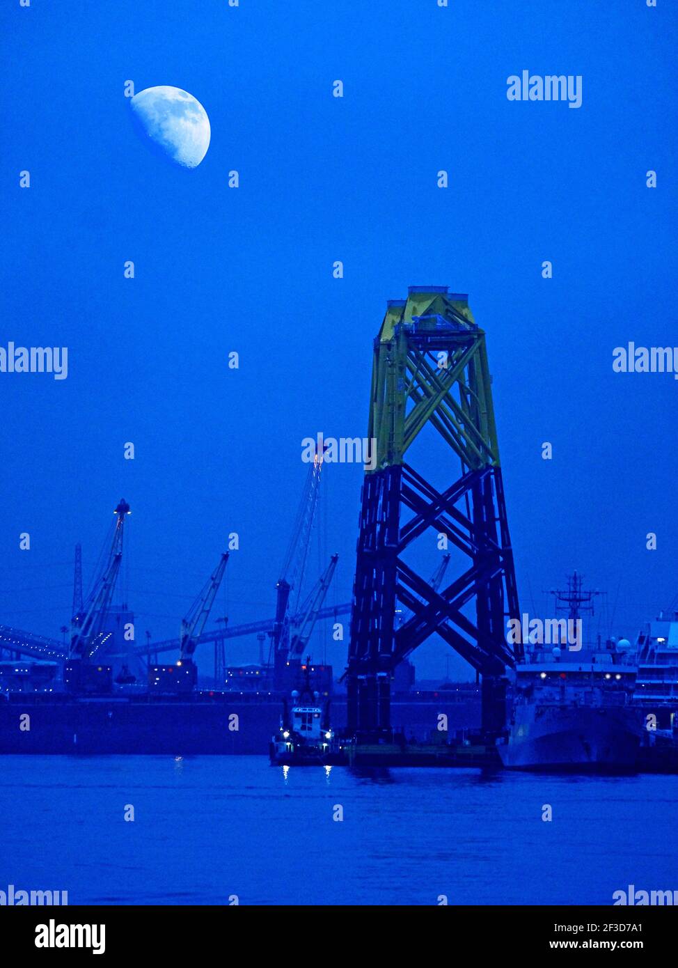 Wind turbine tops on barge Stralsund with tug En Evant 20 waiting at ...
