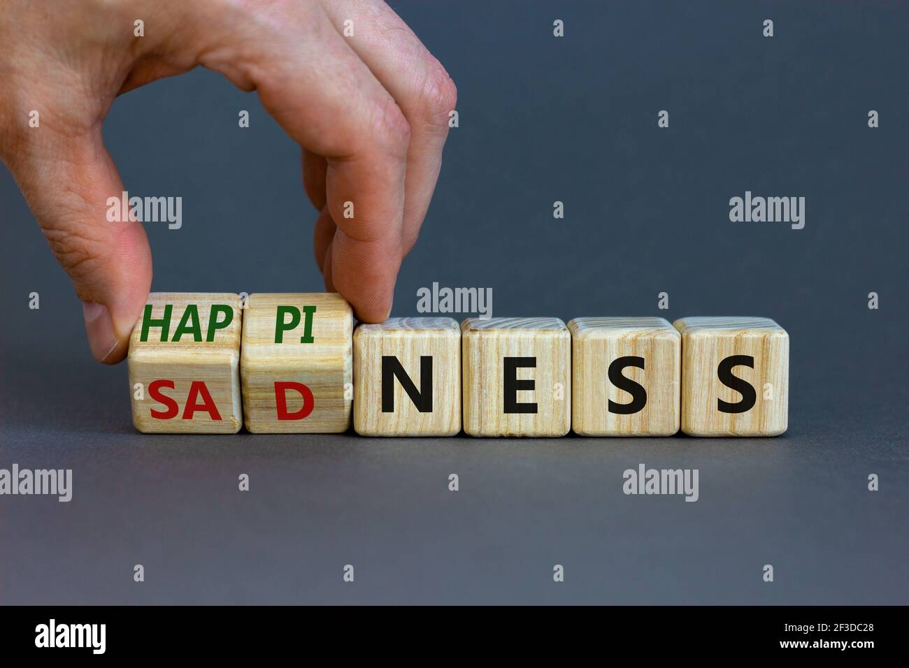 Happiness or sadness symbol. Businessman turns cubes and changes the ...