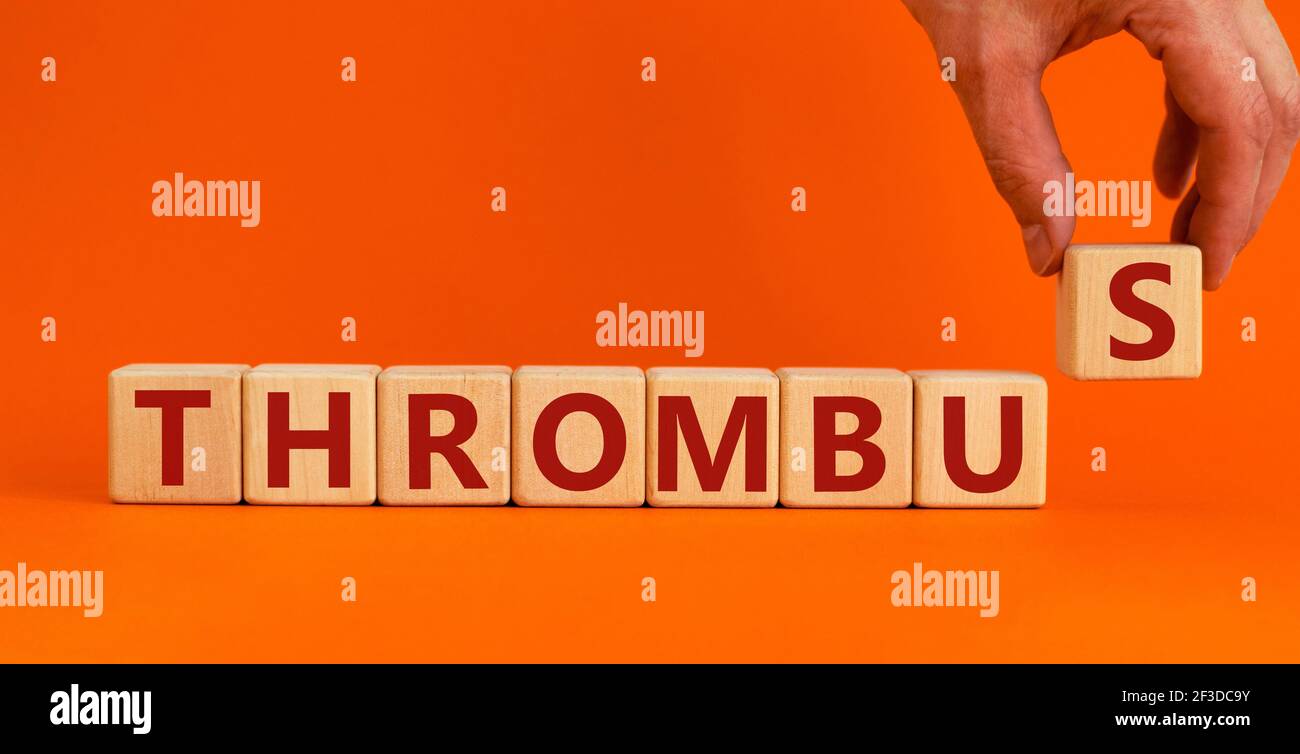 Medical and and thrombus symbol. Wooden cubes with the word 'thrombus ...