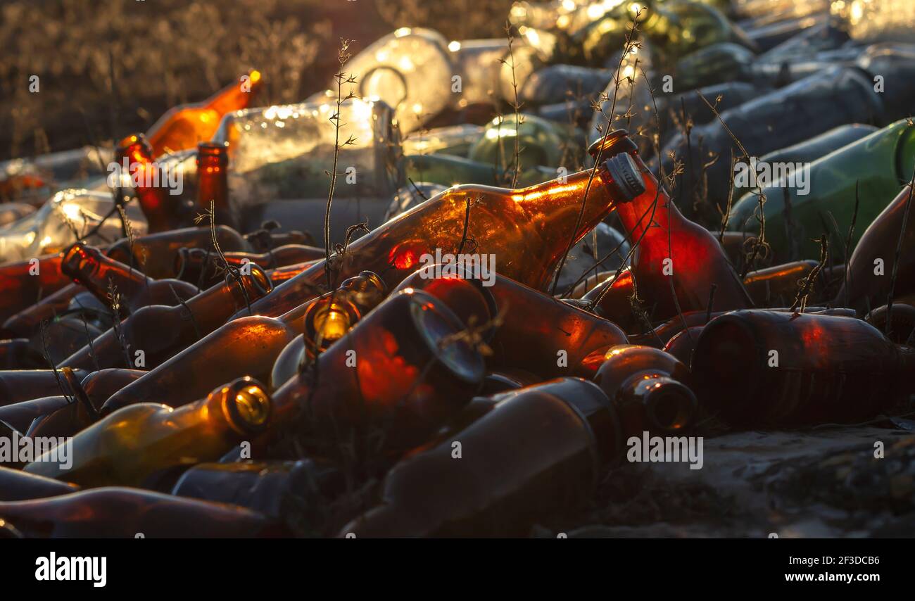 Alcoholic drinks empty glass bottles litter in the countryside Stock ...