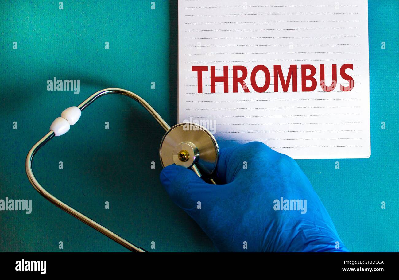 Medical and thrombus symbol. Doctor hand, stethoscope. White note with ...