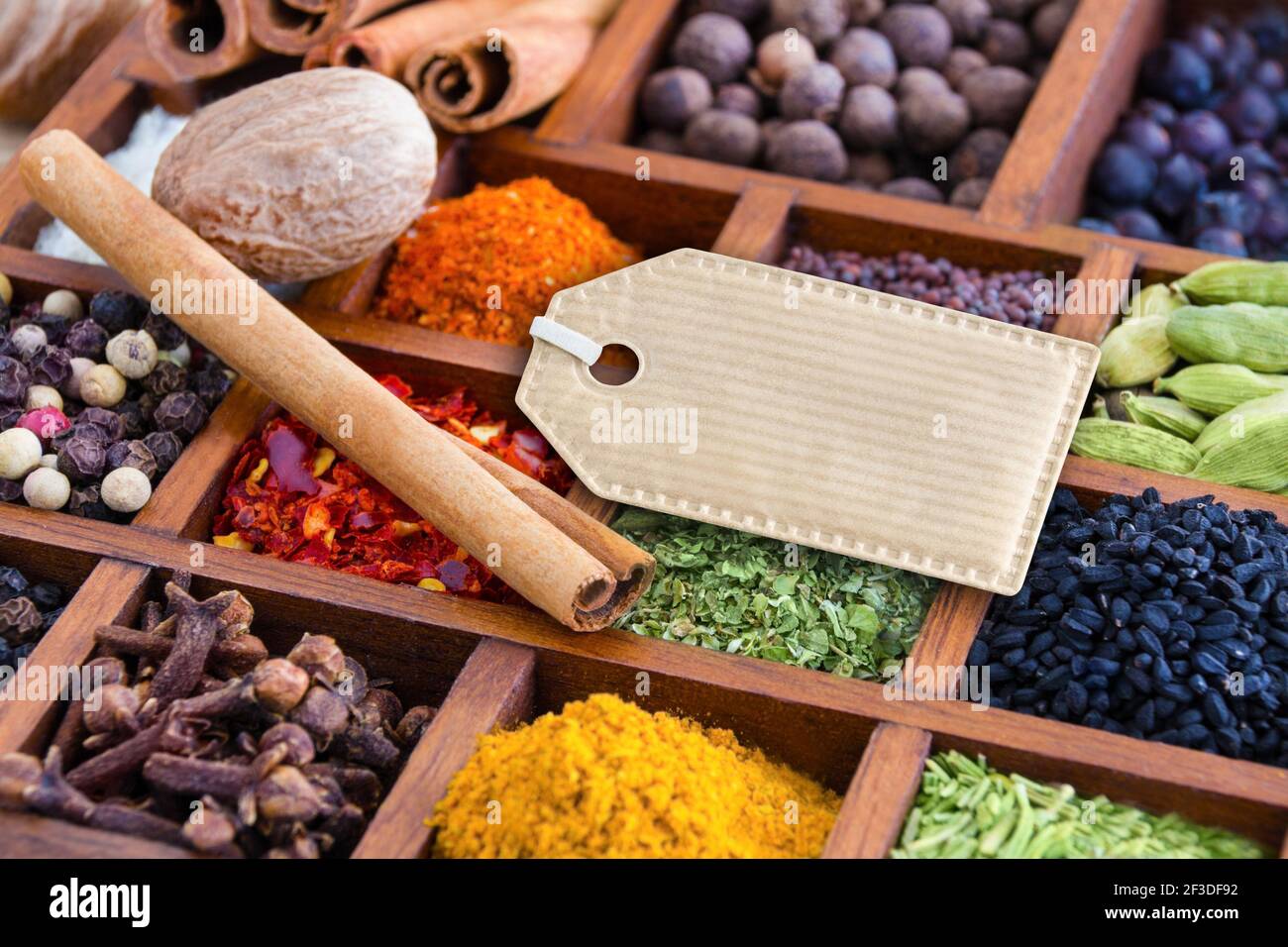 Various spices and label background in wooden box Stock Photo - Alamy