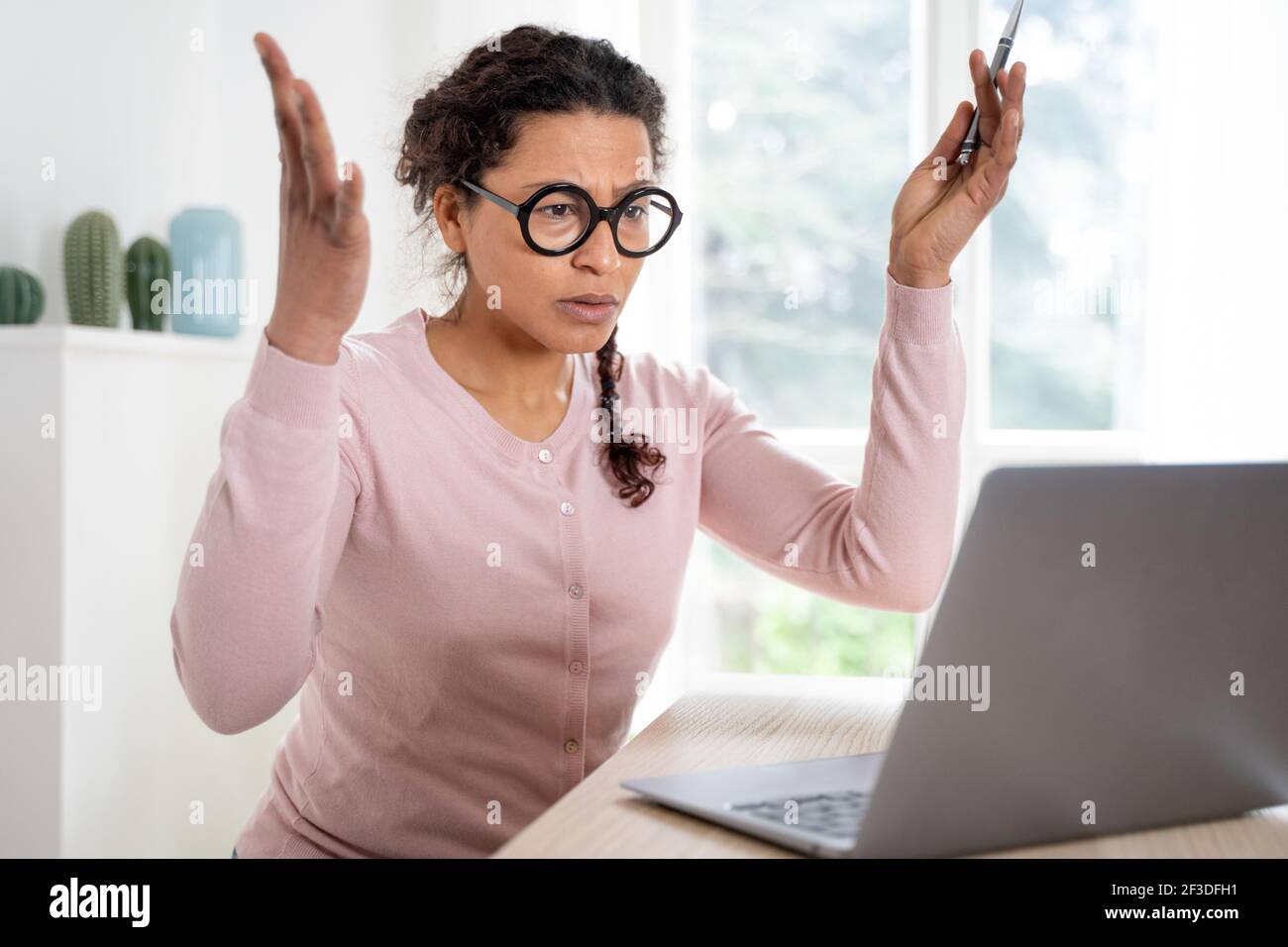 African american woman computer mad hi-res stock photography and images ...