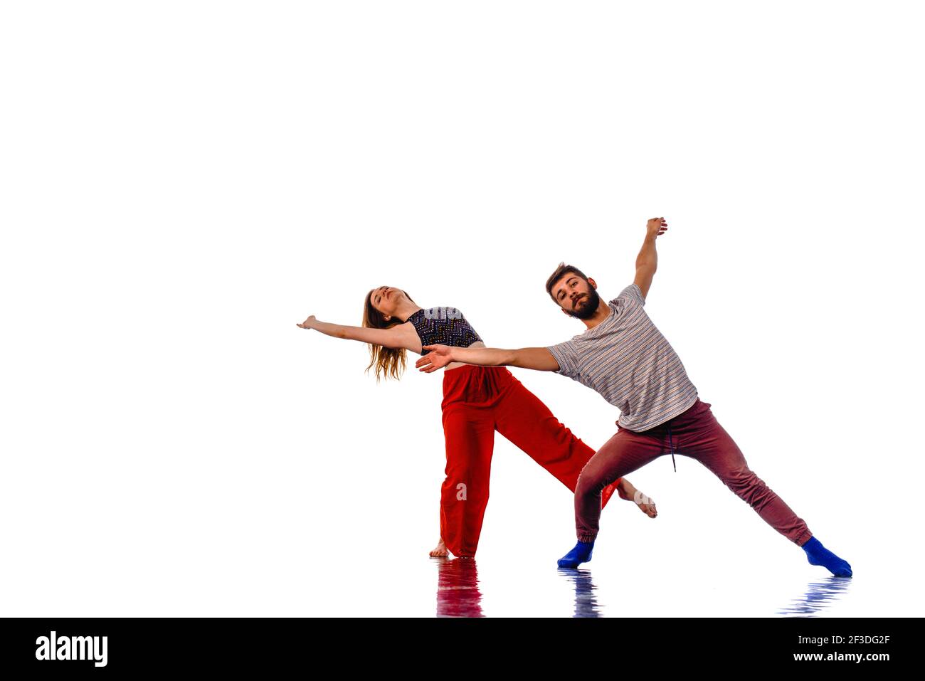Two athletic young dancers making a performance Stock Photo - Alamy