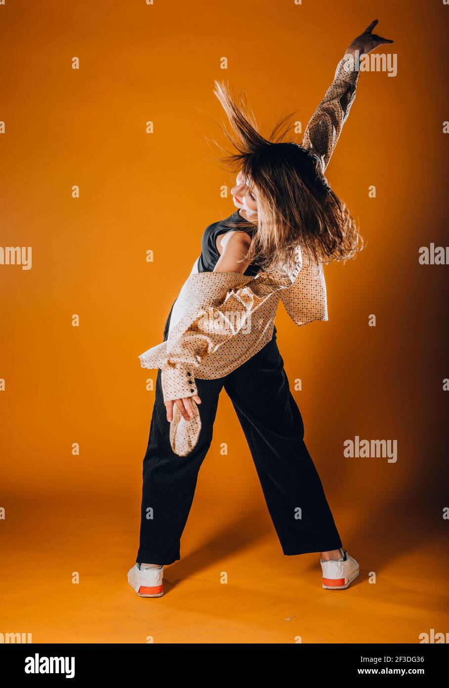 Beautiful girl performing a contemporary dance routine Stock Photo - Alamy