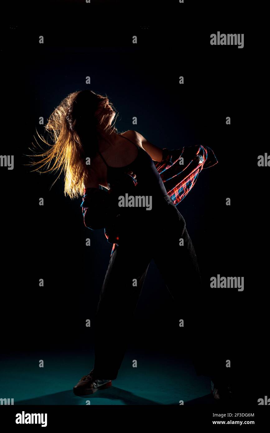 Contemporary dancing performer in a dance practice class isolated on ...