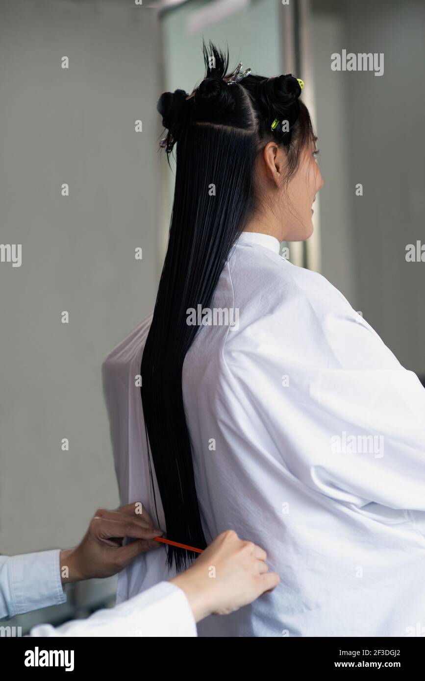 Haircutting in process hi-res stock photography and images - Alamy