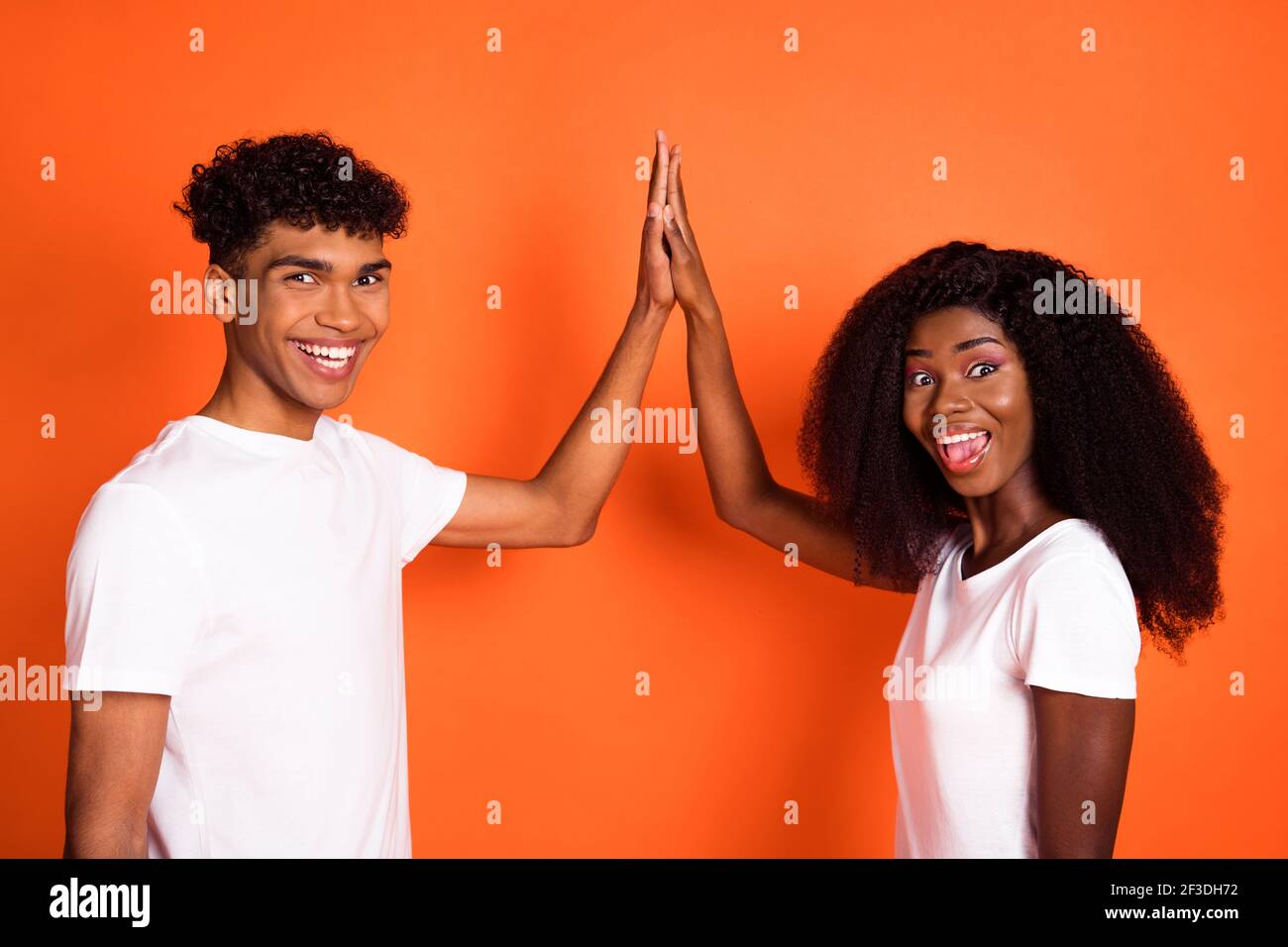 Photo of young happy excited smiling positive afro best friends clap ...