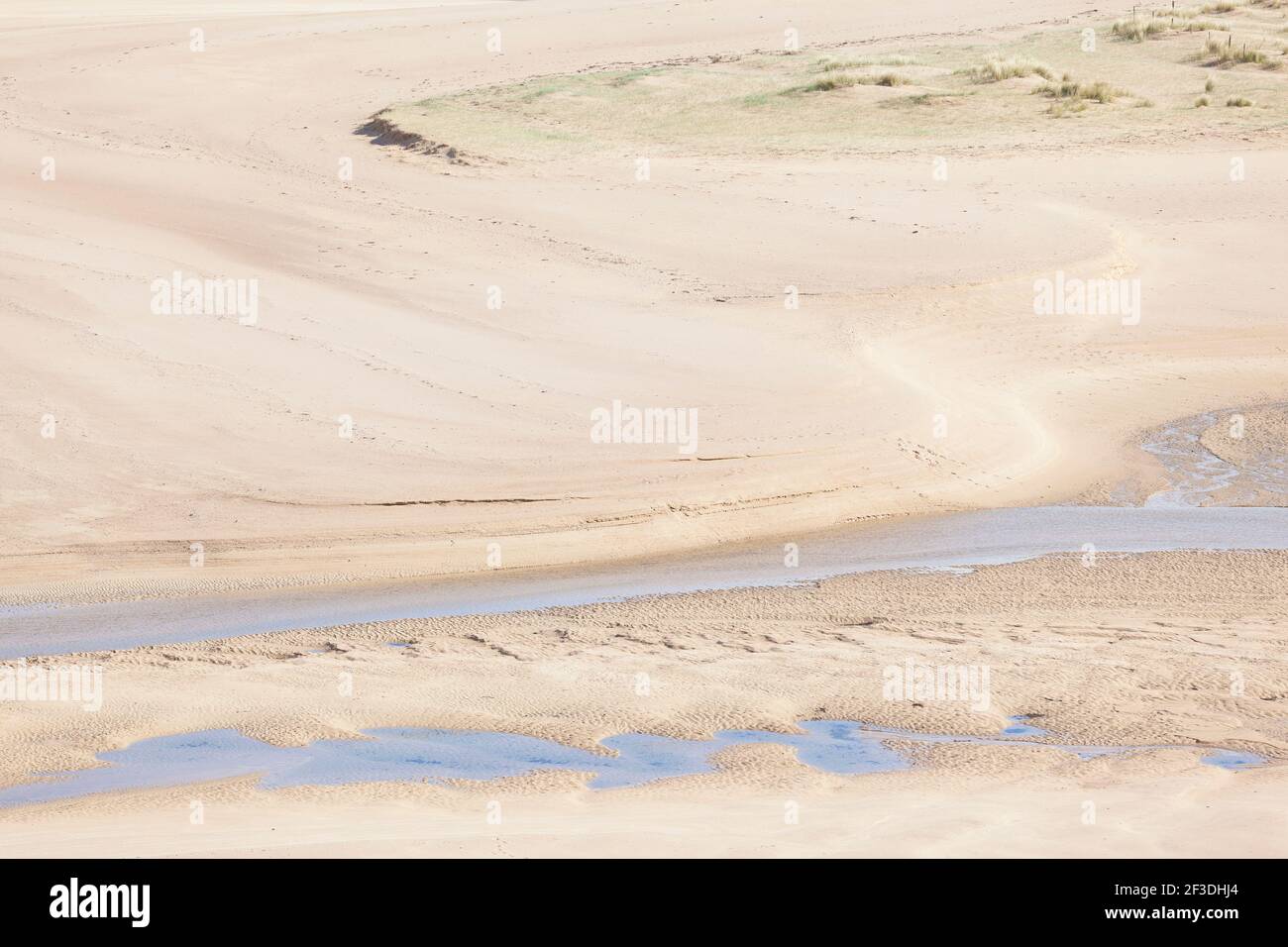 Sand structures on the beach at low tide, like an abstract work of art ...