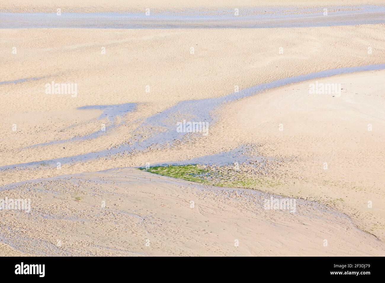 Sand structures on the beach at low tide, like an abstract work of art ...