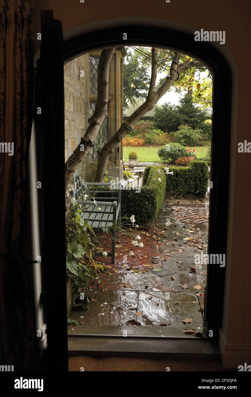 View through a doorway into a garden, England, UK Stock Photo - Alamy