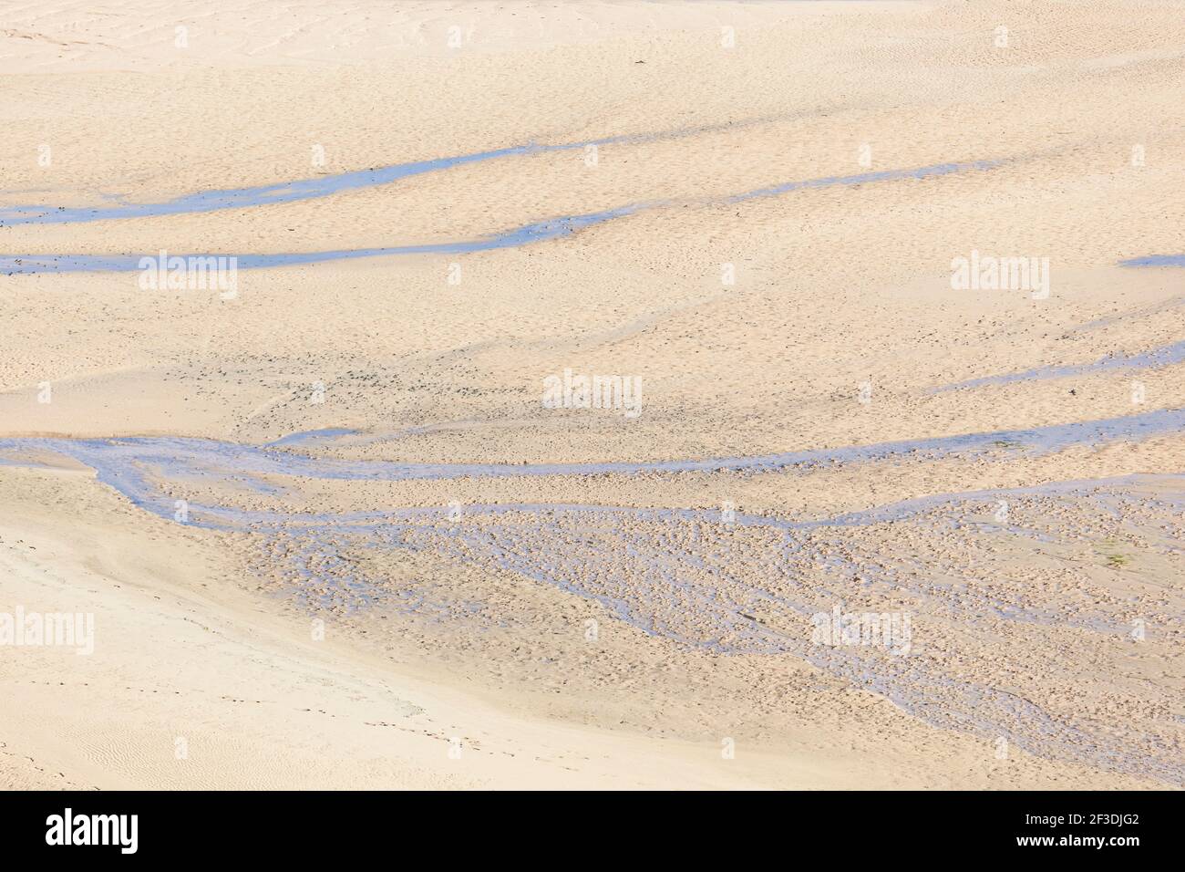 Sand structures on the beach at low tide, like an abstract work of art ...