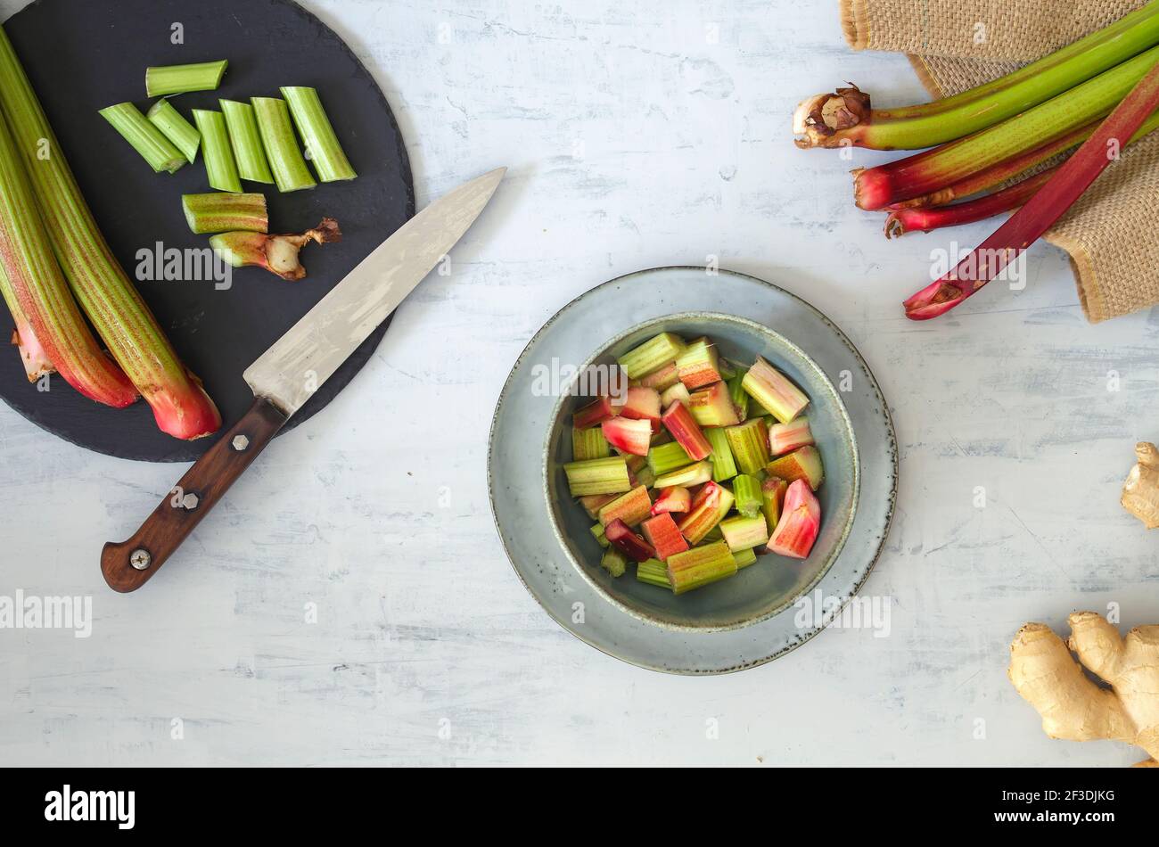 Chopped rhubarb stalks on the kitchen table, top view Stock Photo - Alamy
