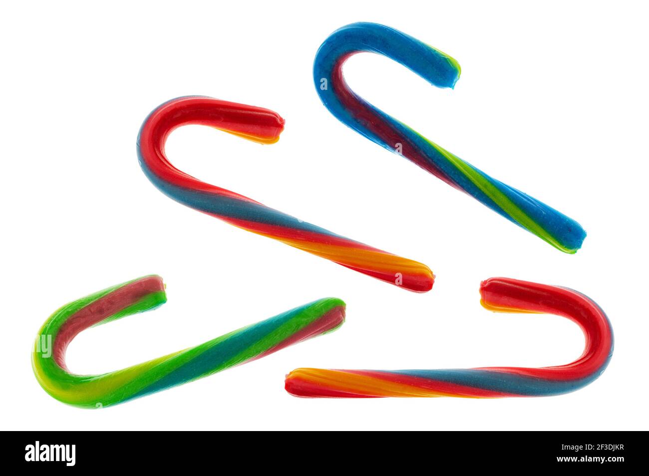Four striped candy canes isolated on a white background Stock Photo - Alamy
