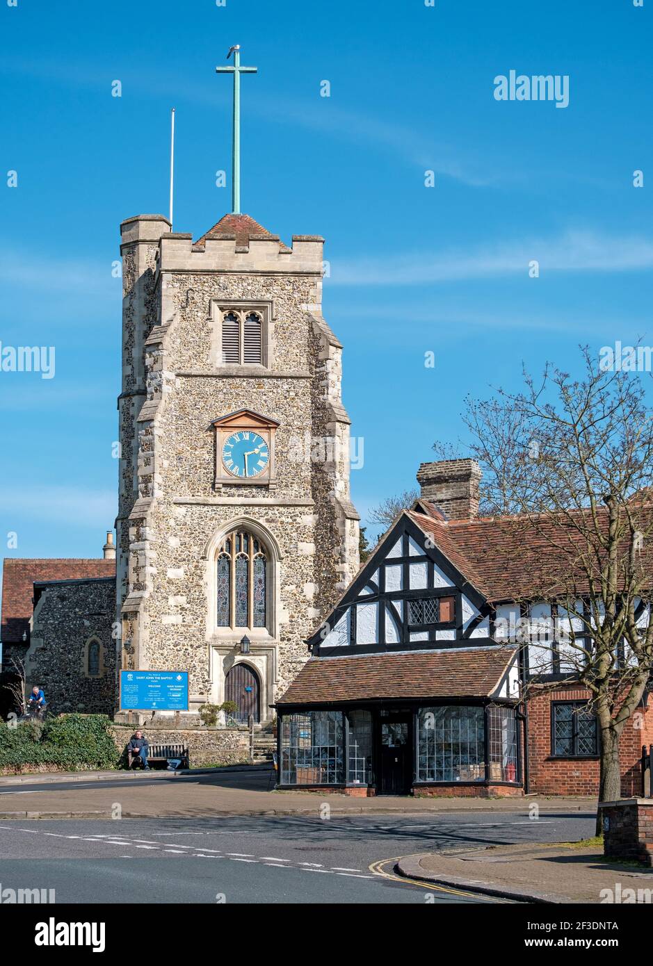 Pinner Village high street with medieval hilltop church St John the ...