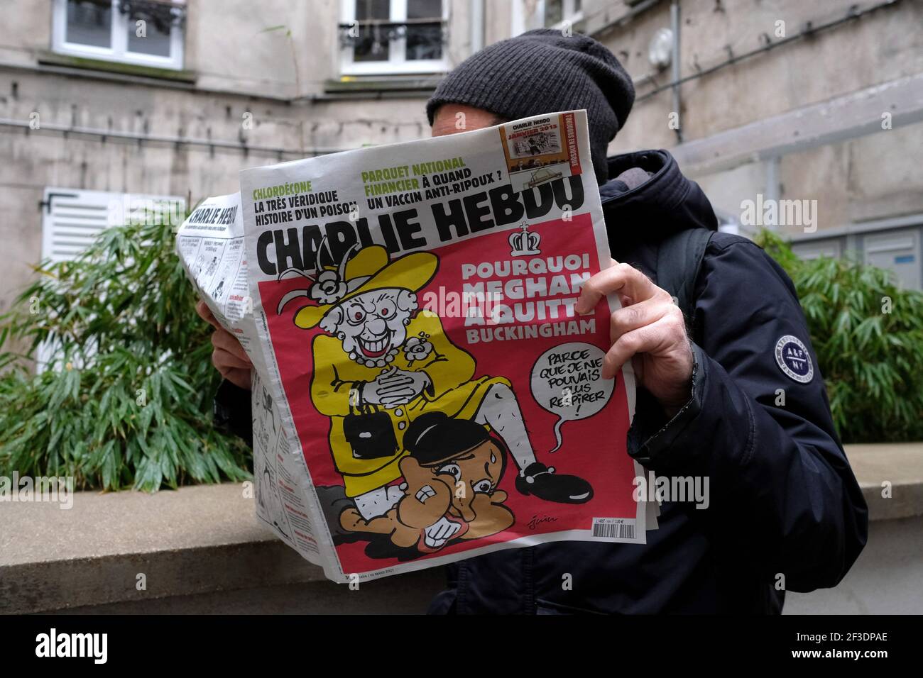 The front page of Charlie Hebdo with Meghan Markle and the Queen ...