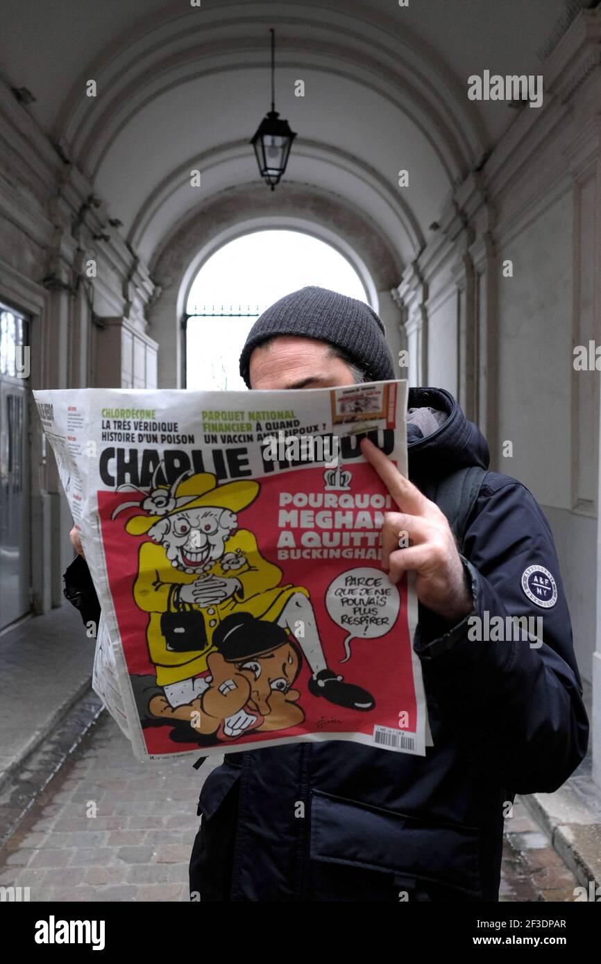 The front page of Charlie Hebdo with Meghan Markle and the Queen ...