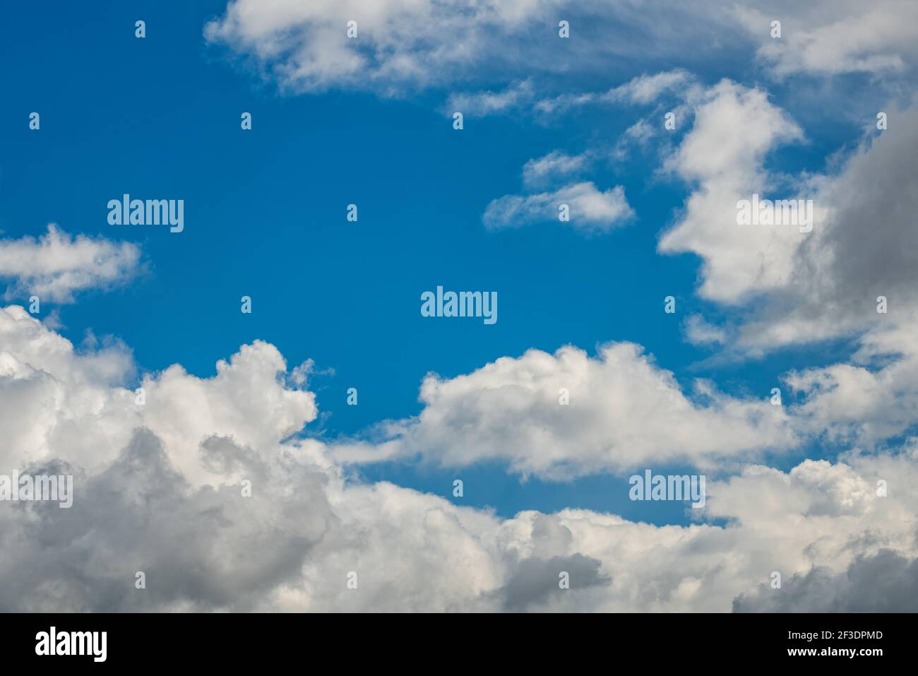 Landscape of a beautiful blue sky covered with cumulonimbus clouds on a ...