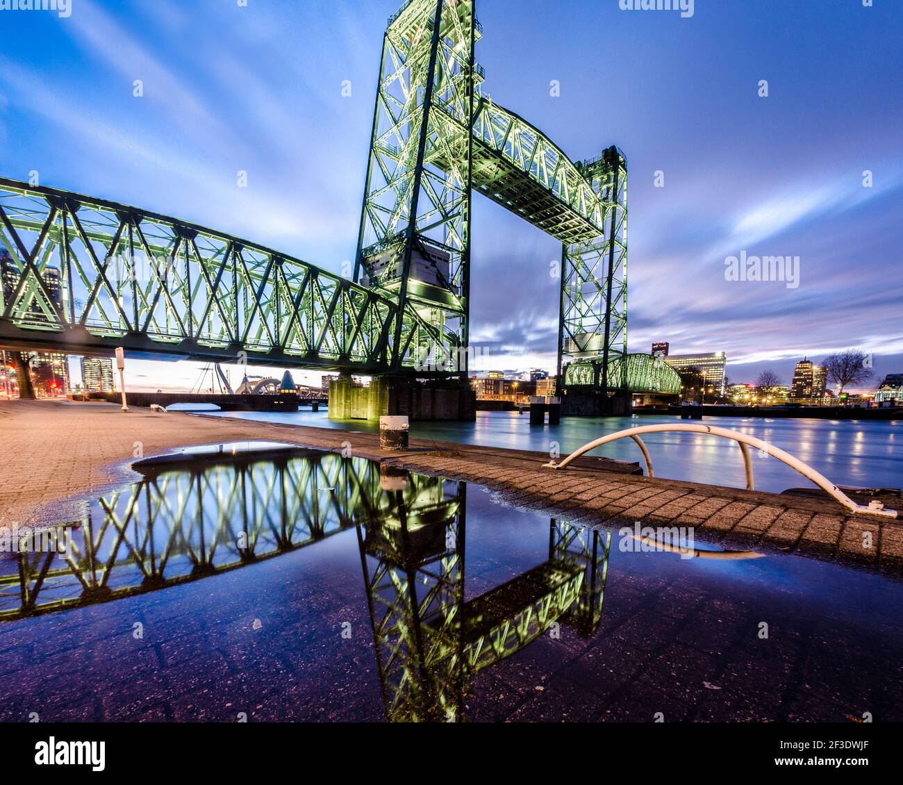 Historic railway truss bridge with lifted middle section in early ...