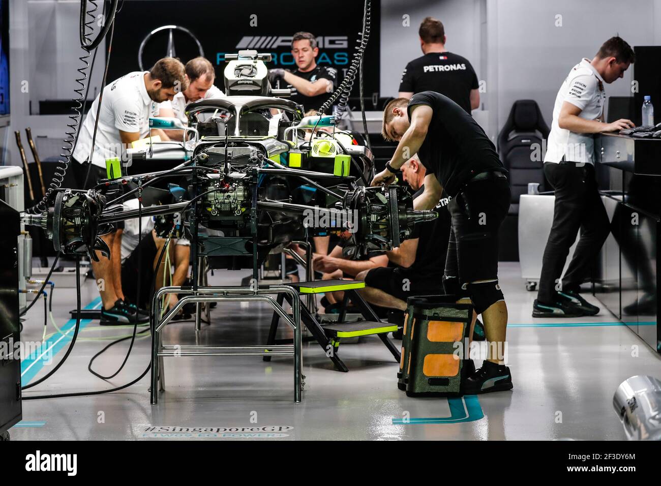 Mechanics working on the Mercedes AMG F1 Petronas GP W09 Hybrid EQ ...