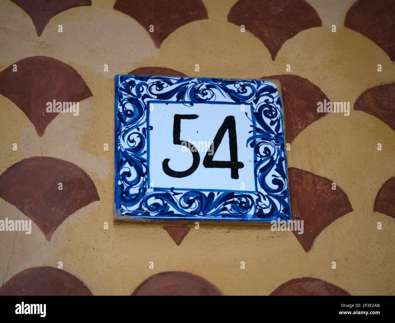 Ceramic tile number 54 detail close up Stock Photo - Alamy