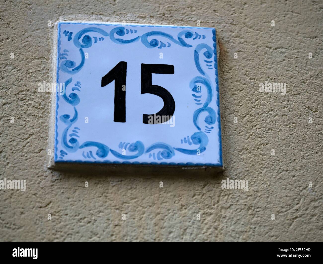 Ceramic tile number 15 detail close up Stock Photo - Alamy