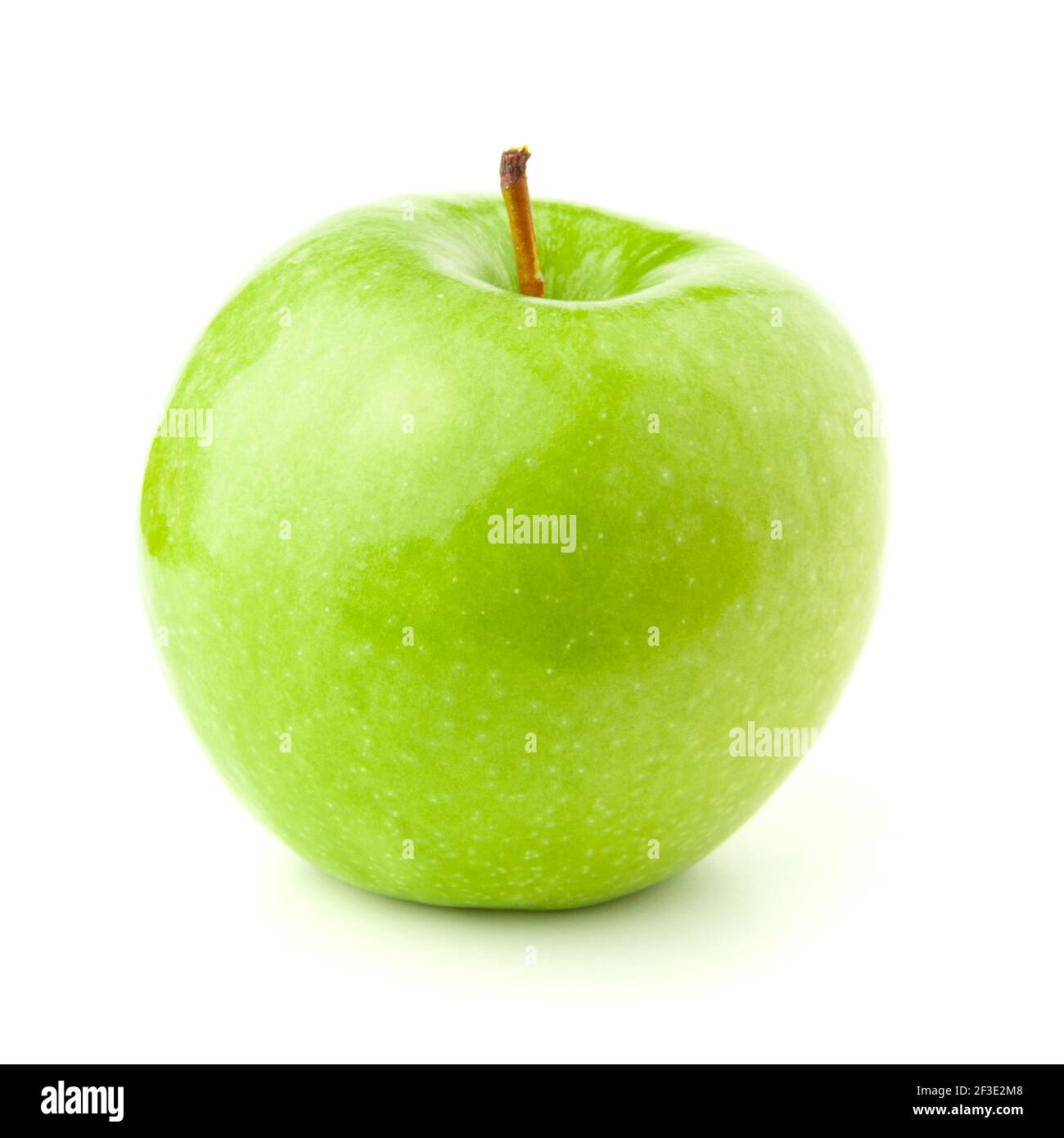 Green apple on a white background with a shadow Stock Photo - Alamy
