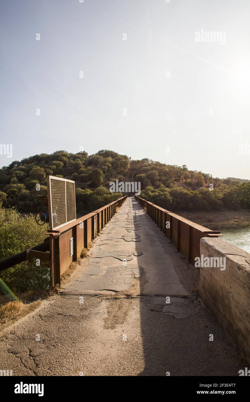 Road bridge over reservoir in Sardinia Stock Photo - Alamy