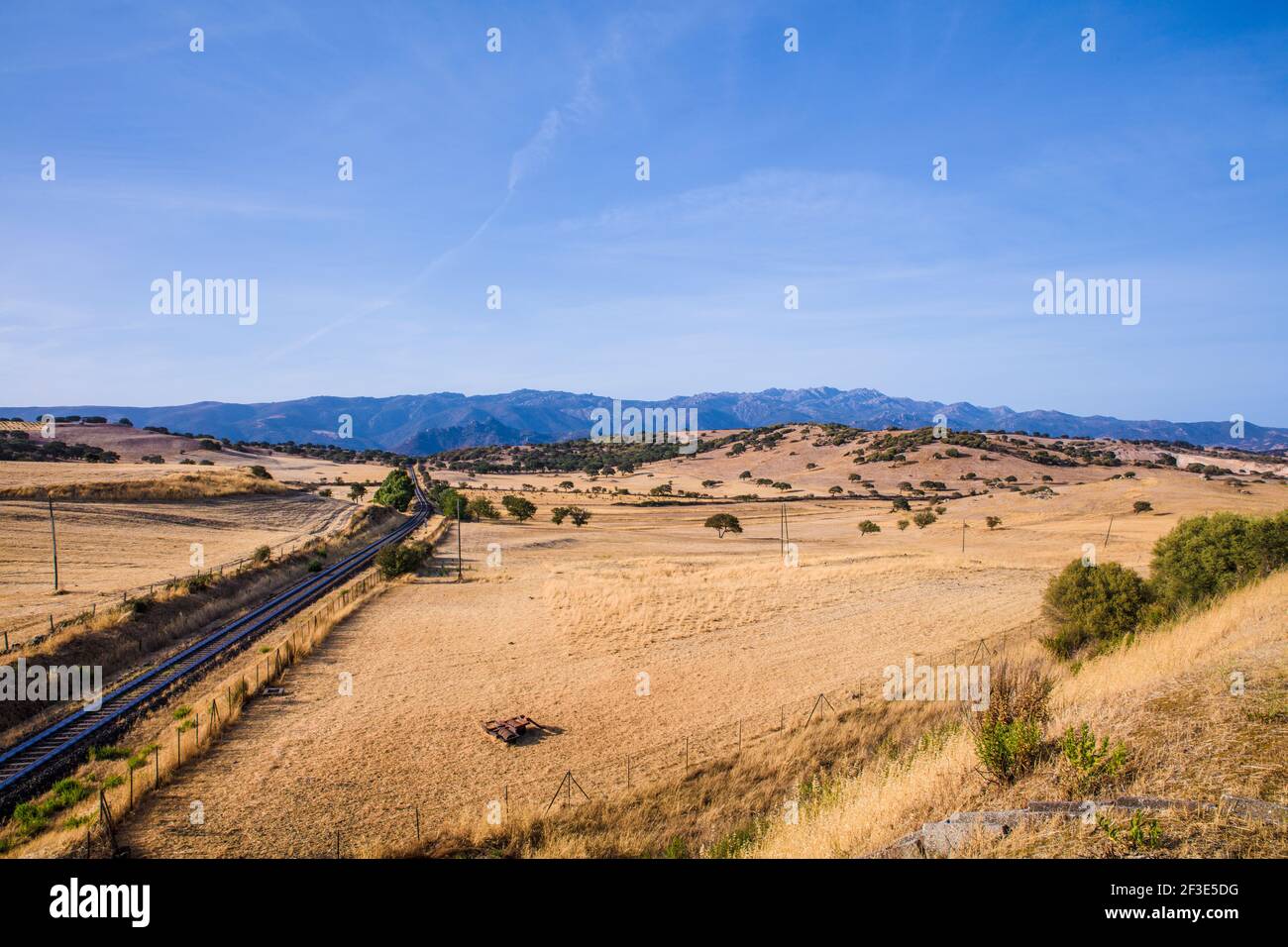 Railway line in Sardinia. Railway lines running through dry countryside ...