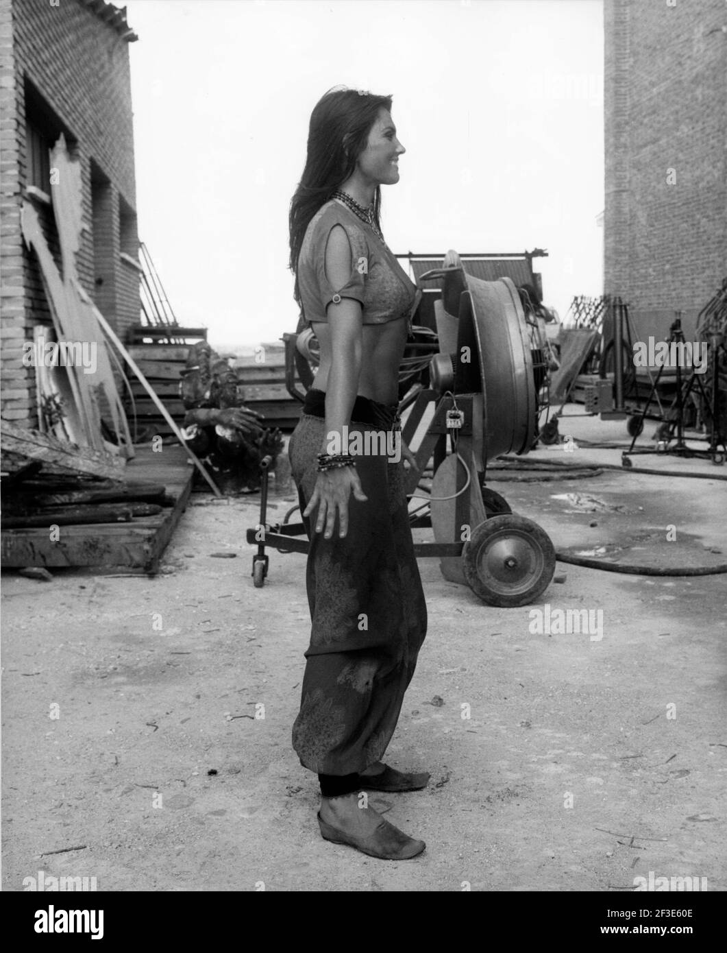CAROLINE MUNRO Costume Reference Still on set candid during filming of ...