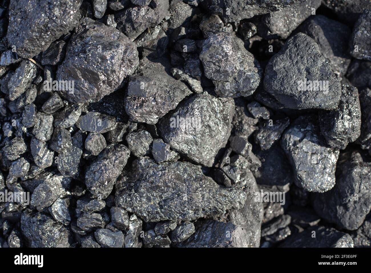Large shiny lumps of coal. Mineral, mineral fuel for home stoves and ...