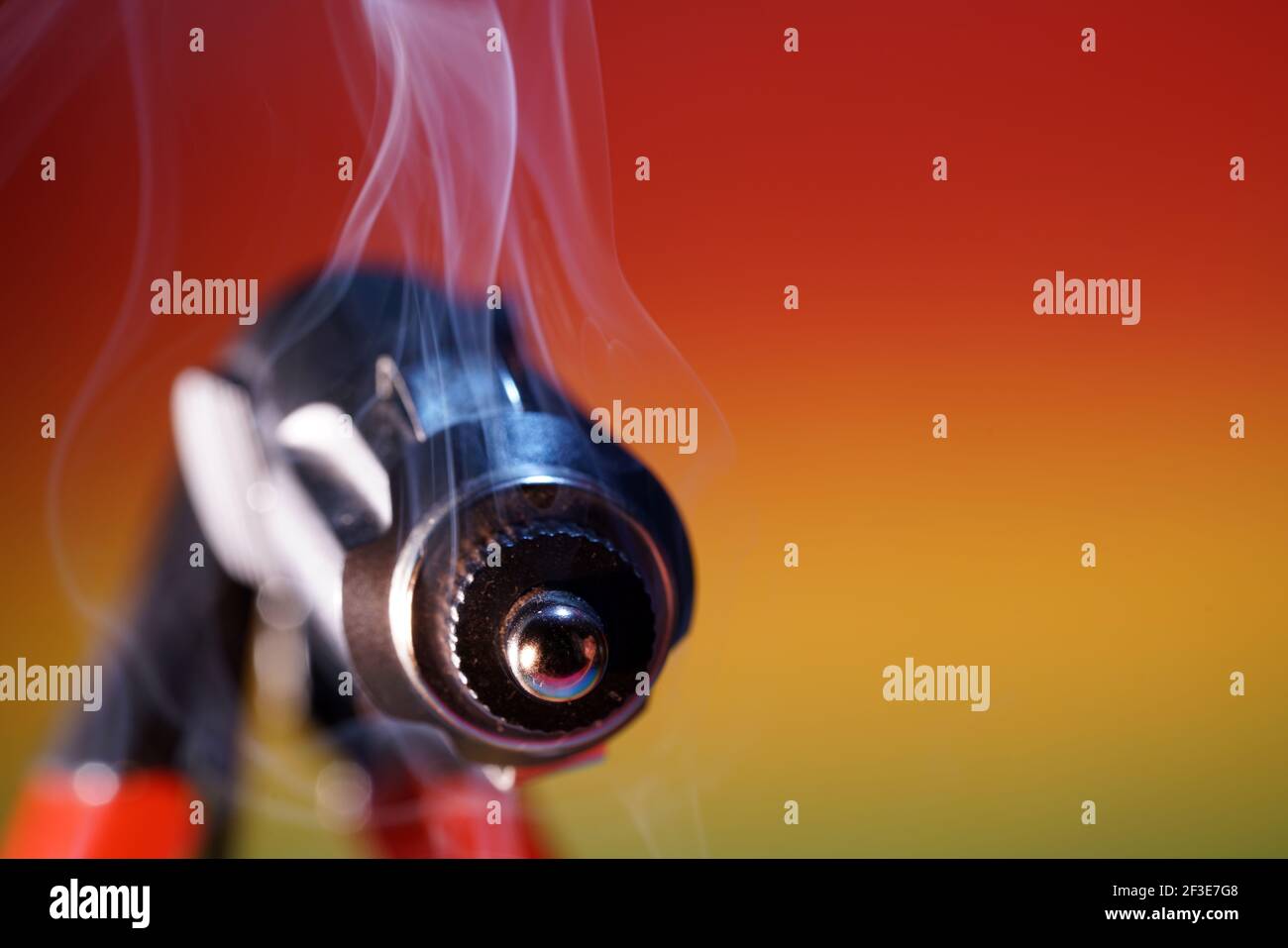 A closeup of a drill with smoke Stock Photo - Alamy