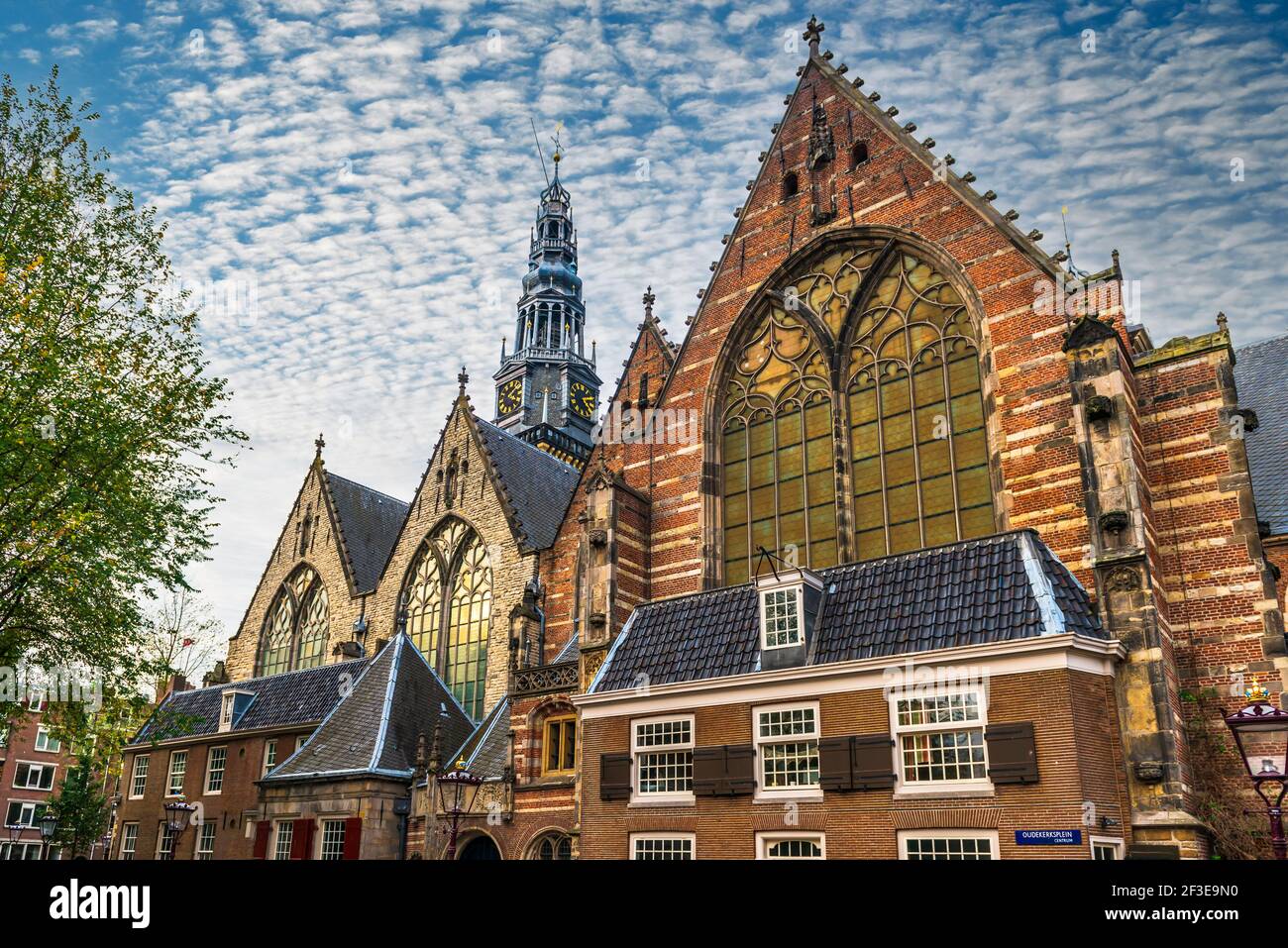 Side view of the Calvinist Oude Kerk church in the De Wallen district ...