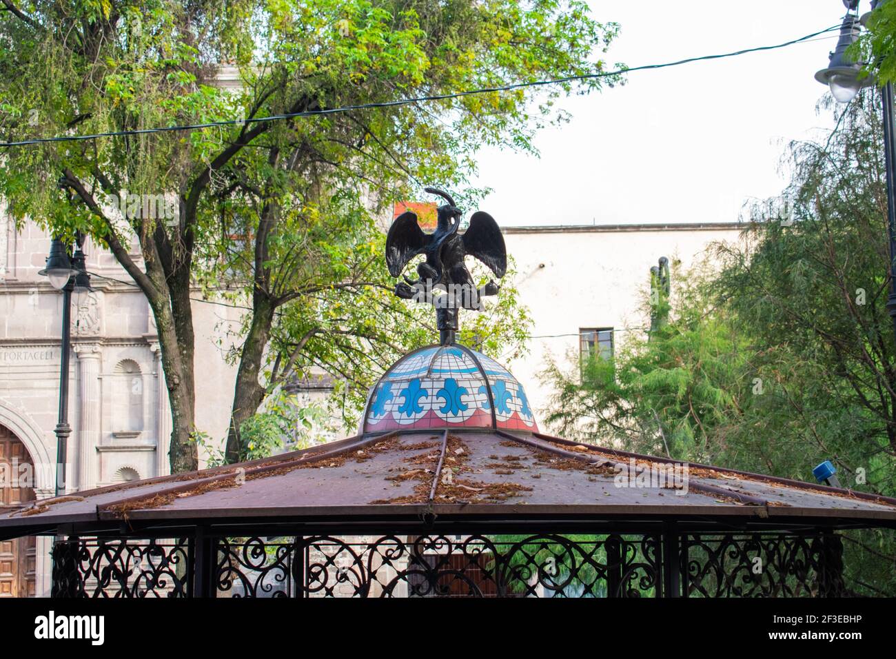 Statue of eagle and snake on top of a kiosk Stock Photo - Alamy