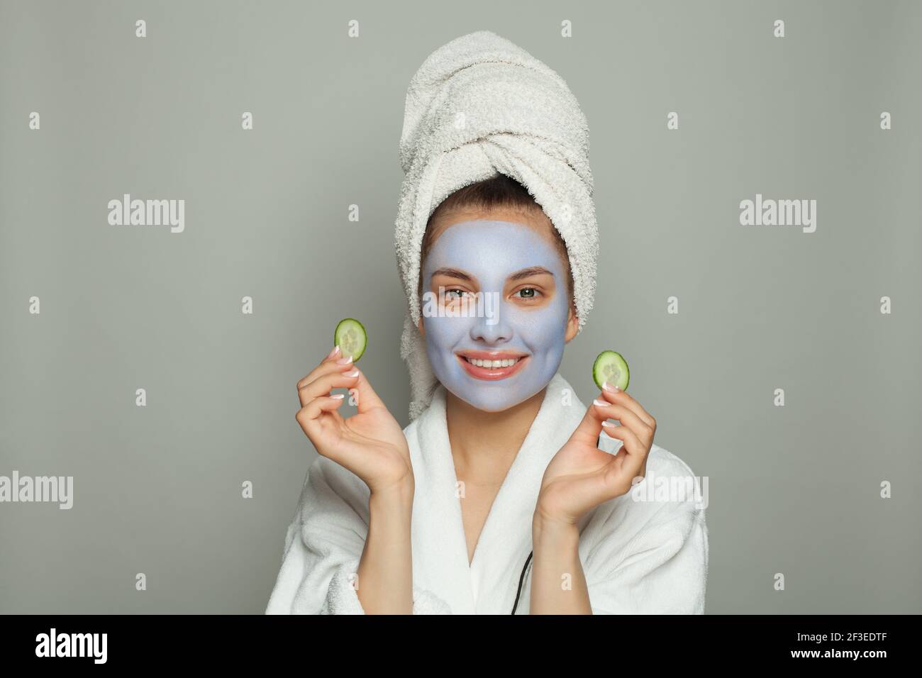 Smiling young woman green facial mask hi-res stock photography and ...