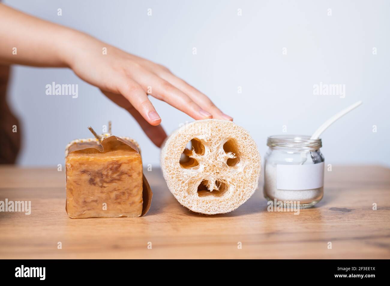 Female hand , fibrous sponge - luffa, natural laundry soap and baking ...