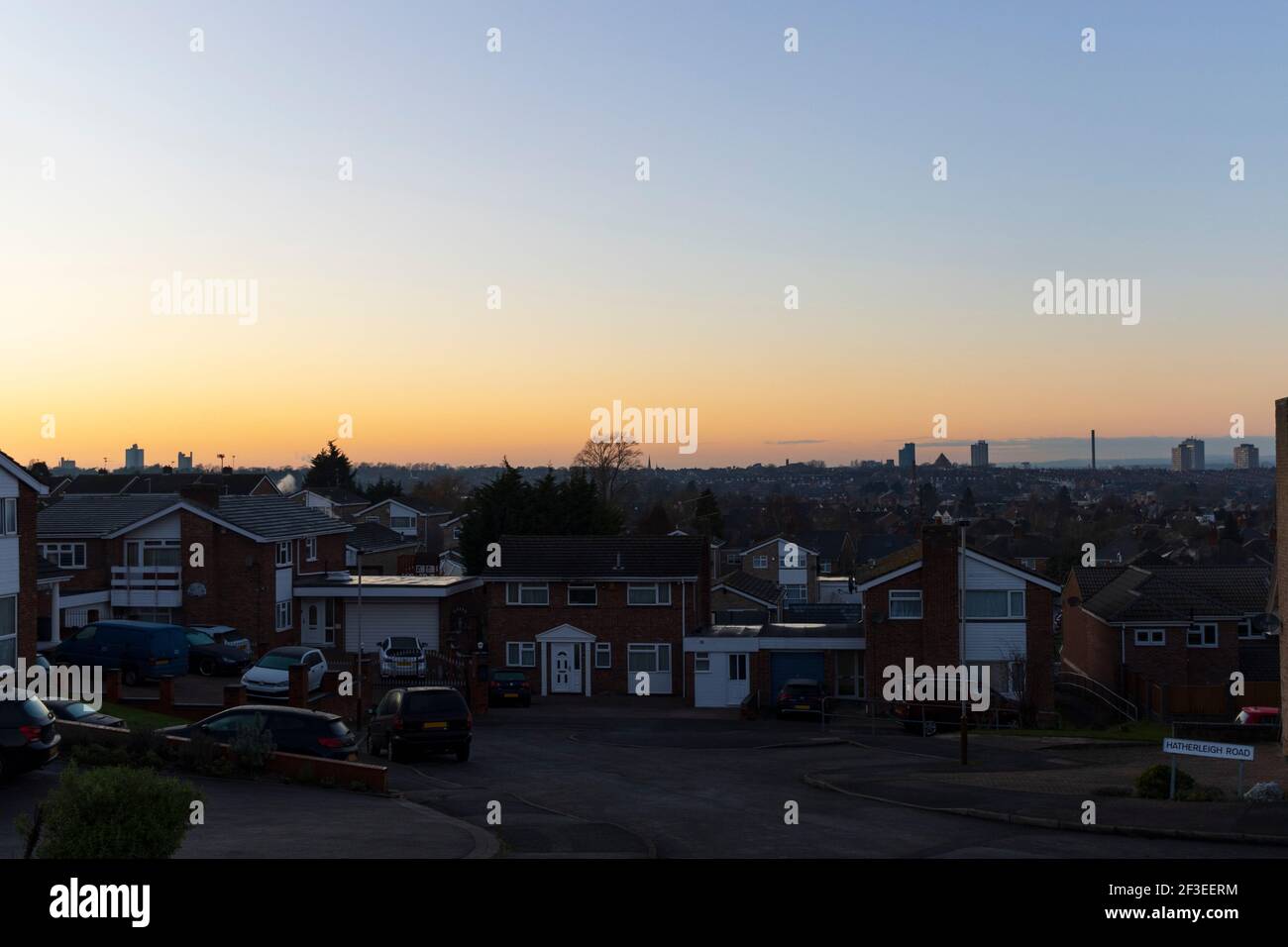 Nighttime looking over the tops of houses and Leicester city centre ...