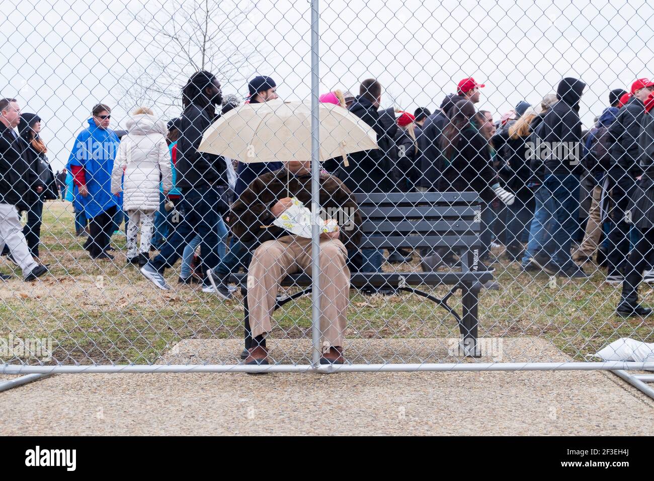 Man eating Subway sandwich on a bench inside secure Mall area chain ...