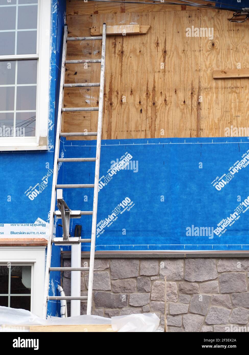 Ladders are a useful bit of equipment to use outside Stock Photo - Alamy