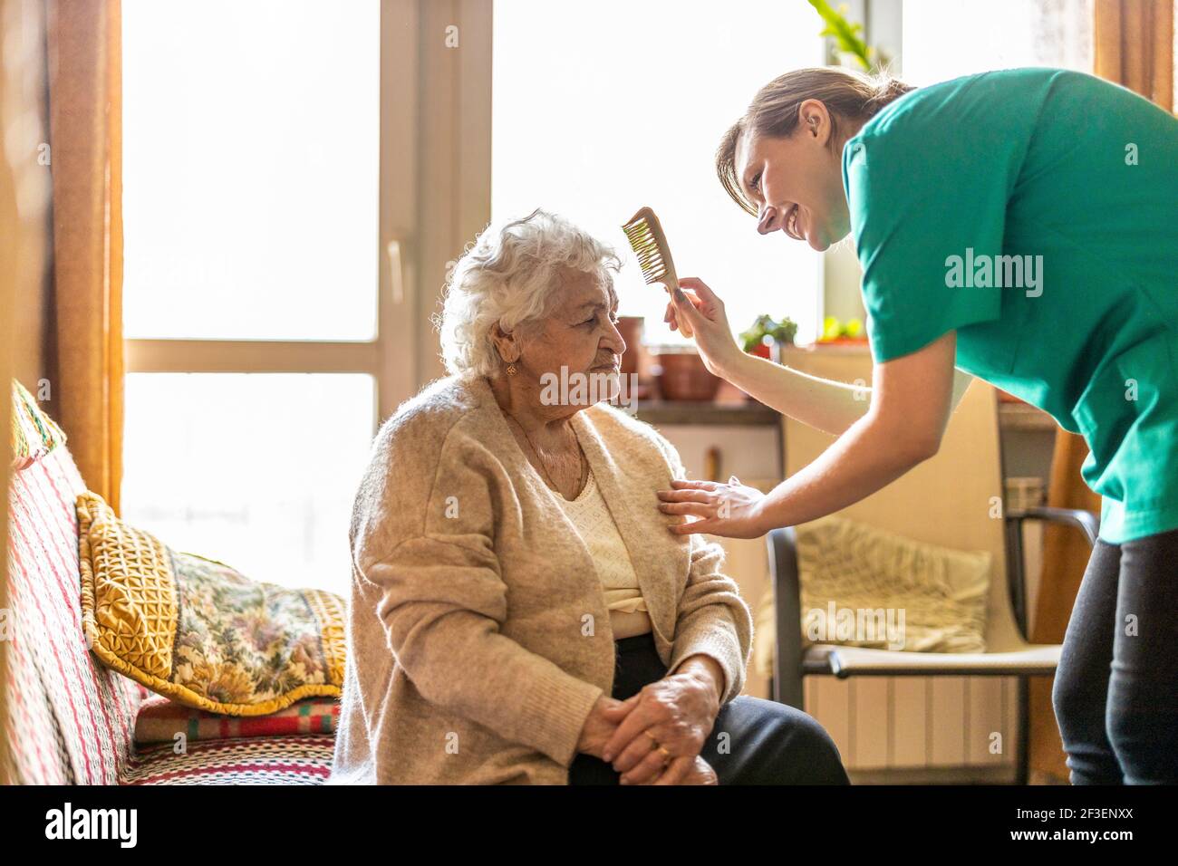 Young nurse elderly patient hi-res stock photography and images - Alamy
