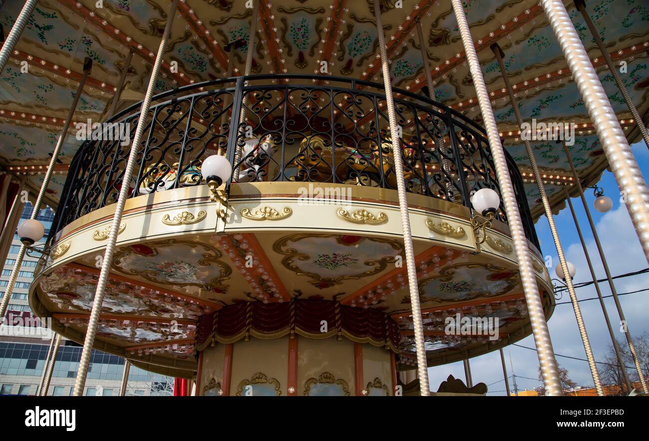 Old classic French vintage carousel in a holiday park. Moscow, Russia ...