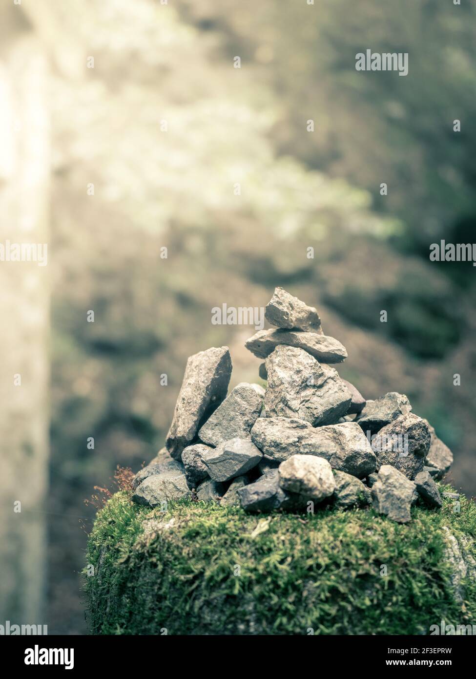 Vertical shot stack pebbles hi-res stock photography and images - Alamy