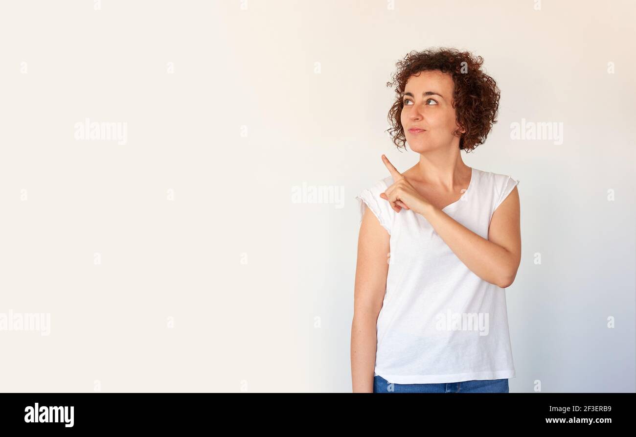 Woman points direction hi-res stock photography and images - Alamy